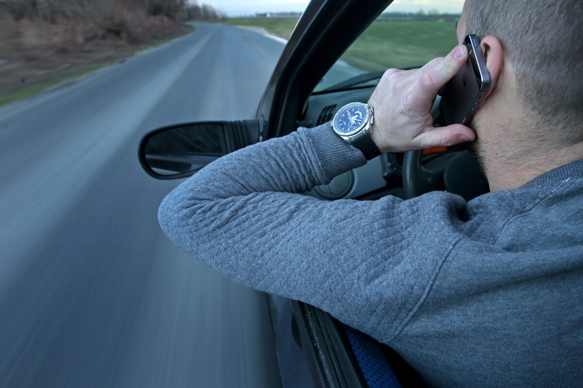 3 out of 5 professional drivers use their mobile phones every day while ...